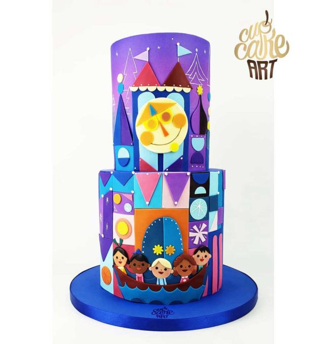 Colorful Its A Small World Cake - Between The Pages Blog
